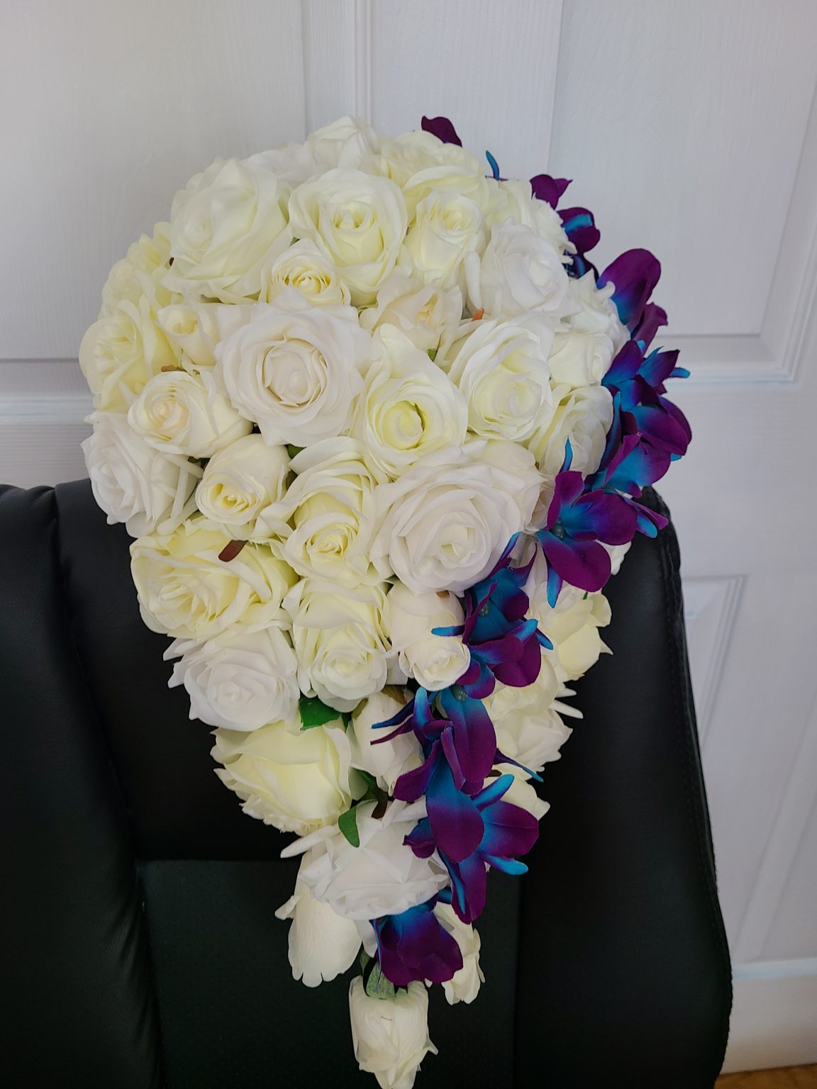 Dress My Wedding – Cascading rose bouquet with orchid accent